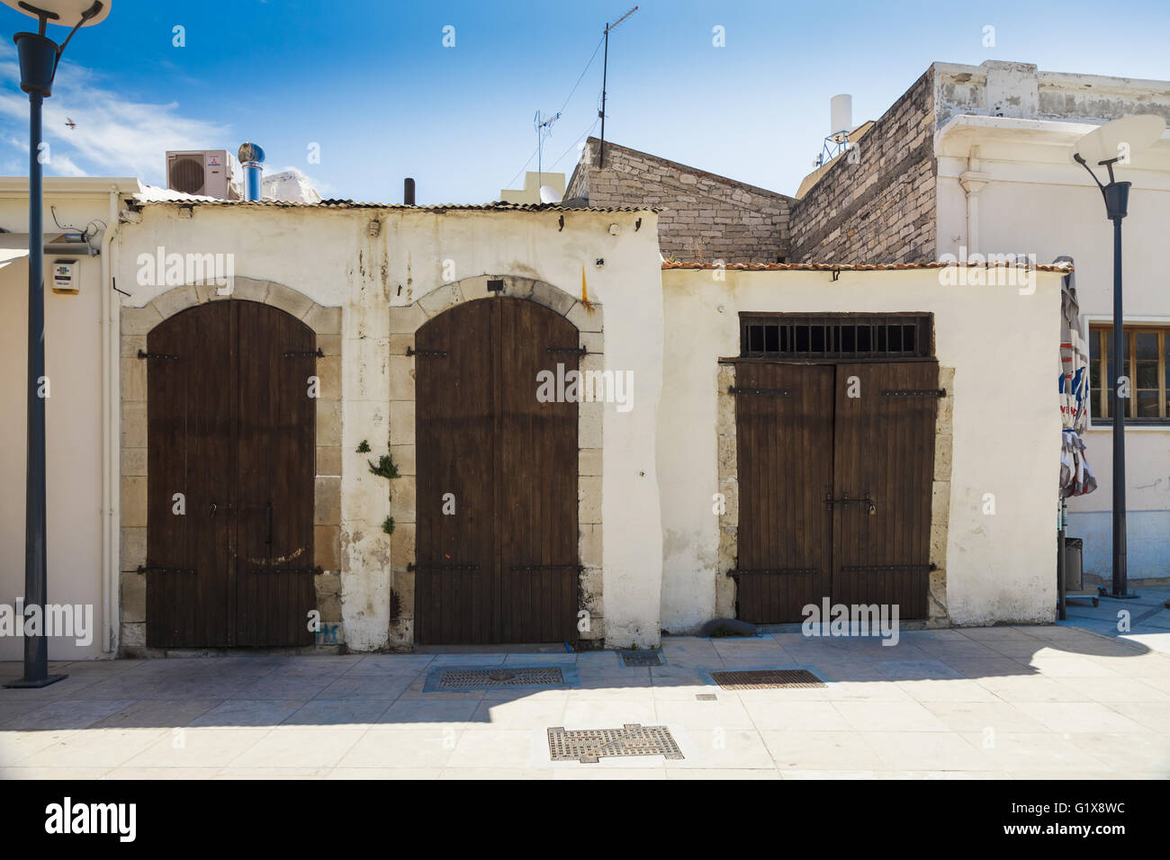 Wooden doors in old brick house in the city of Limassol, Cyprus Stock ...