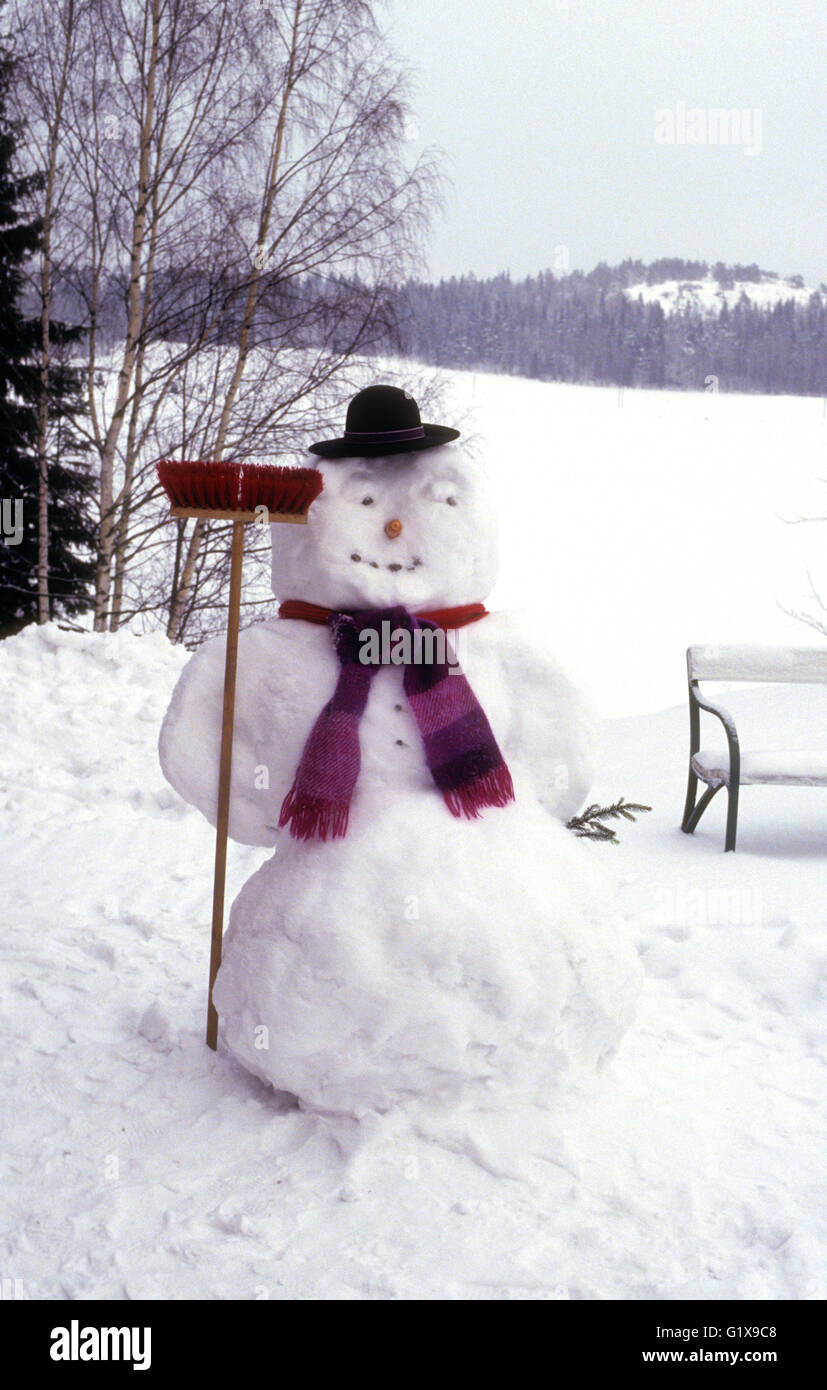 Snowman dressed in traditional outfit Stock Photo - Alamy