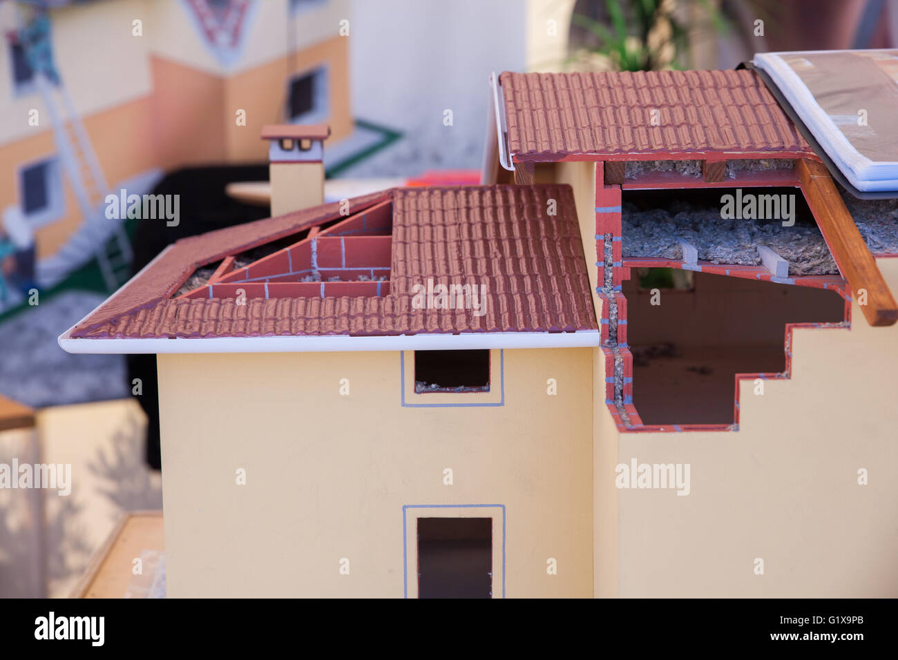 Model of detached house on white background Stock Photo - Alamy