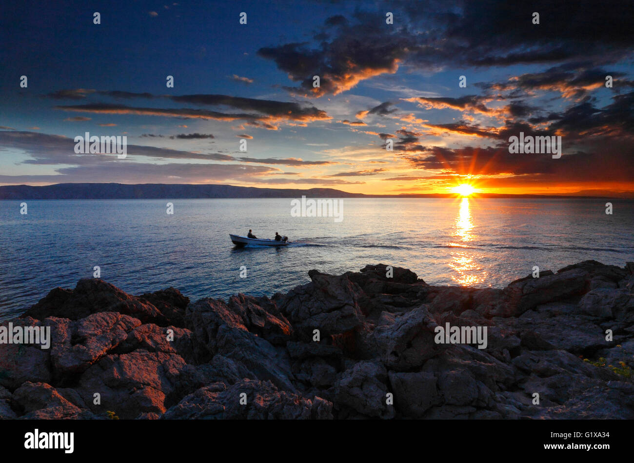 Dramatic sunset landscape at sea Stock Photo - Alamy