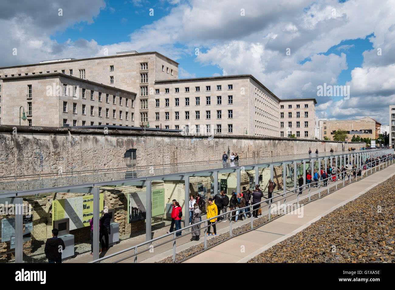 View of tourists visiting outdoor museum at Topography of Terror former ...