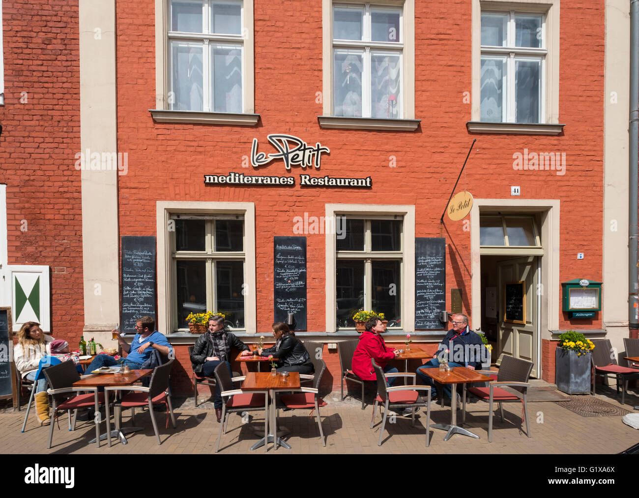 Cafe in front of traditional Dutch style house in Dutch Quarter in ...
