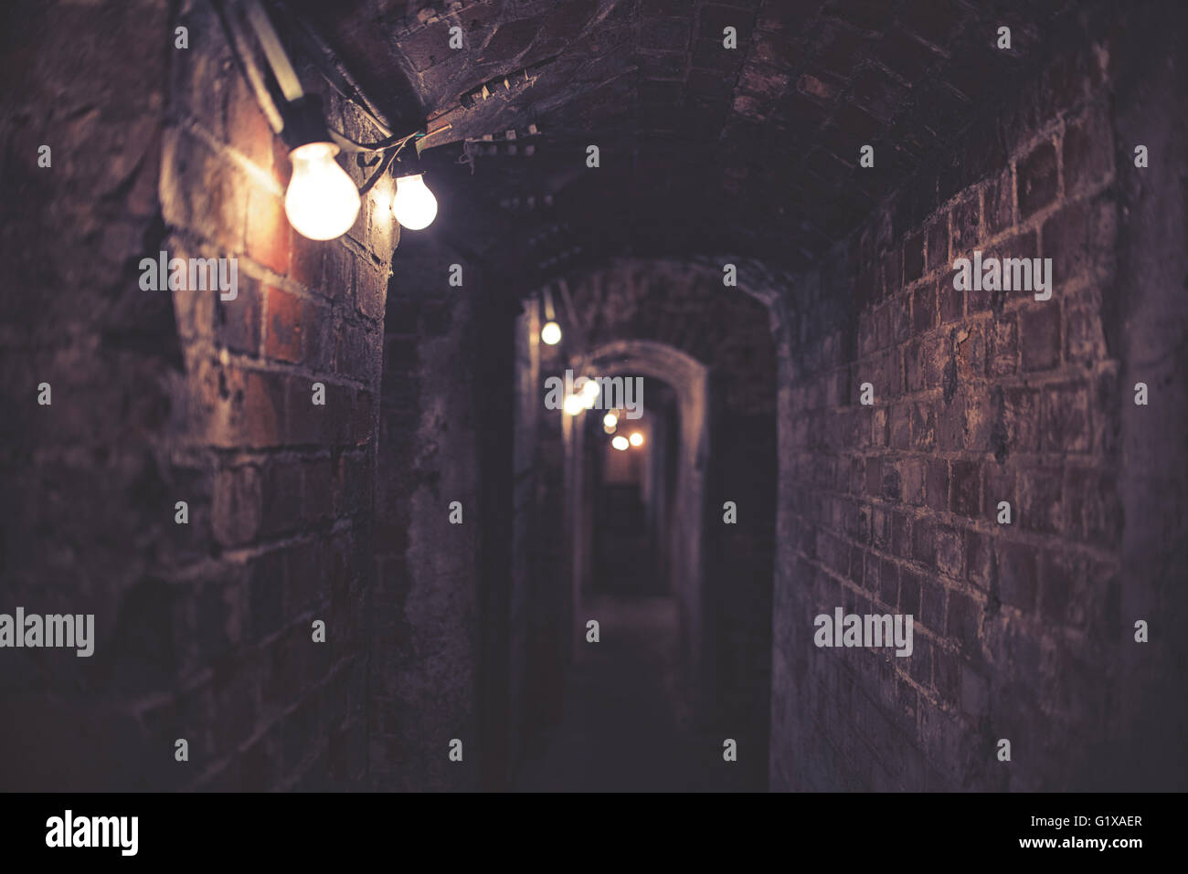 Dark spooky tunnel with power lines, noise Stock Photo - Alamy