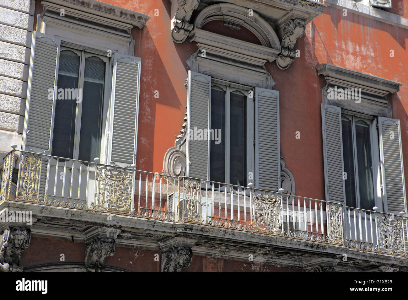Ornate roman windows shutters hi-res stock photography and images - Alamy