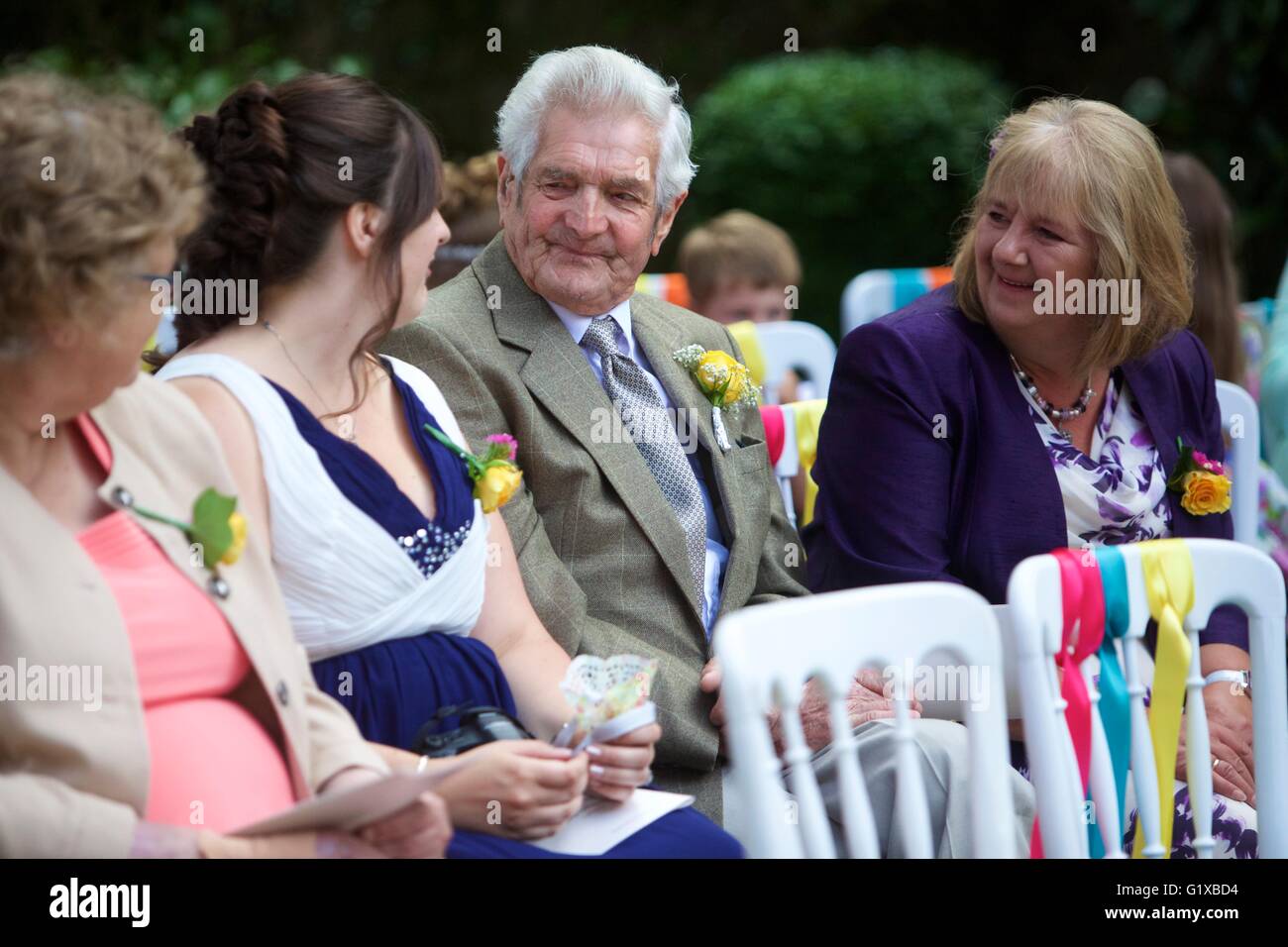 Talking to guests hi-res stock photography and images - Alamy