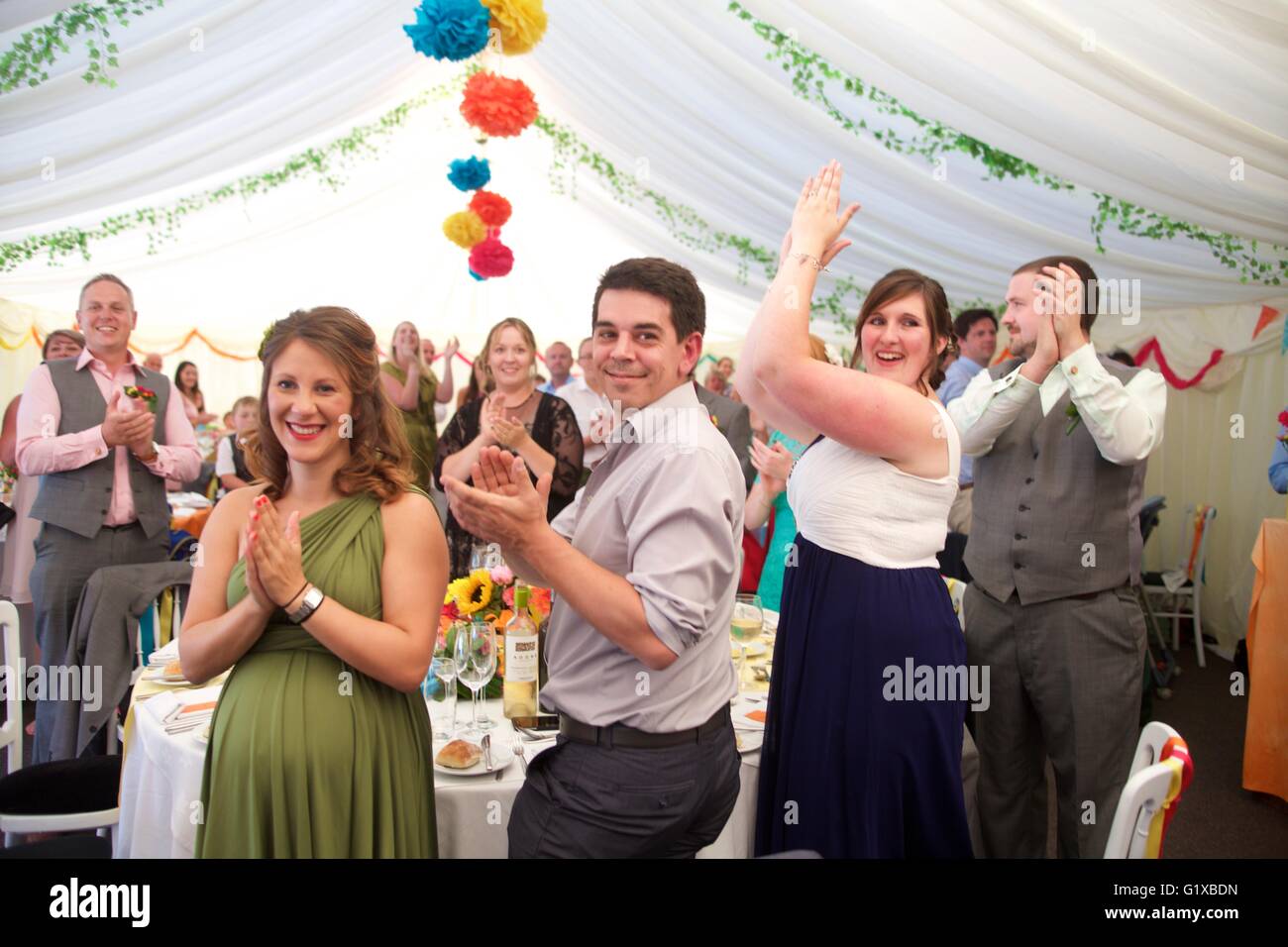 Woman clapping dinner party hi-res stock photography and images - Alamy