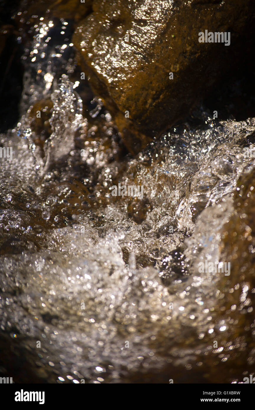 Splashing water in small stream Stock Photo - Alamy