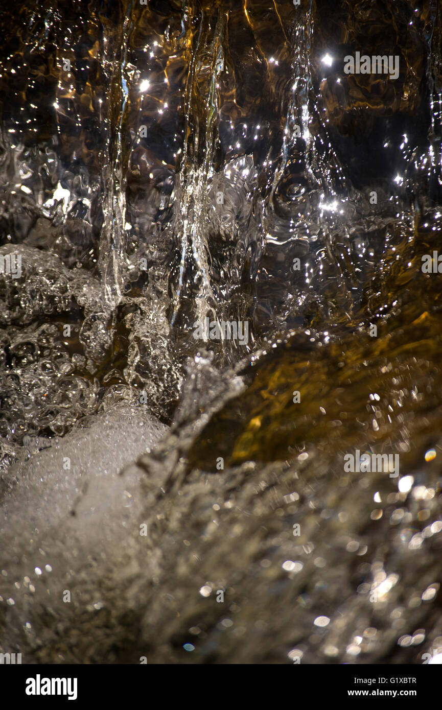 Splashing water in small stream Stock Photo - Alamy