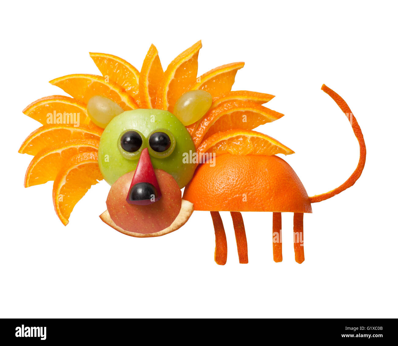 Happy lion made of fruits on isolated background Stock Photo - Alamy