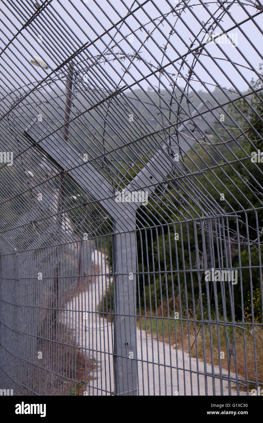 A fence surrounding a military base in Northern Israel Stock Photo - Alamy