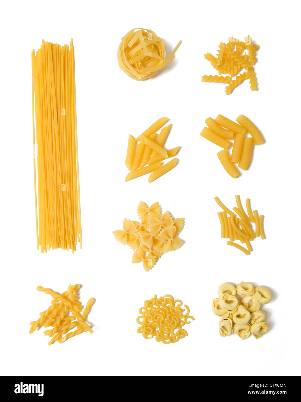 pasta uncooked, isolated on white background Stock Photo - Alamy