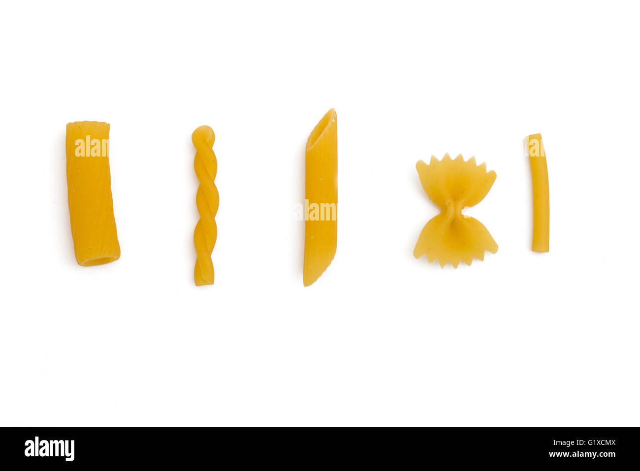 pasta uncooked, isolated on white background Stock Photo - Alamy