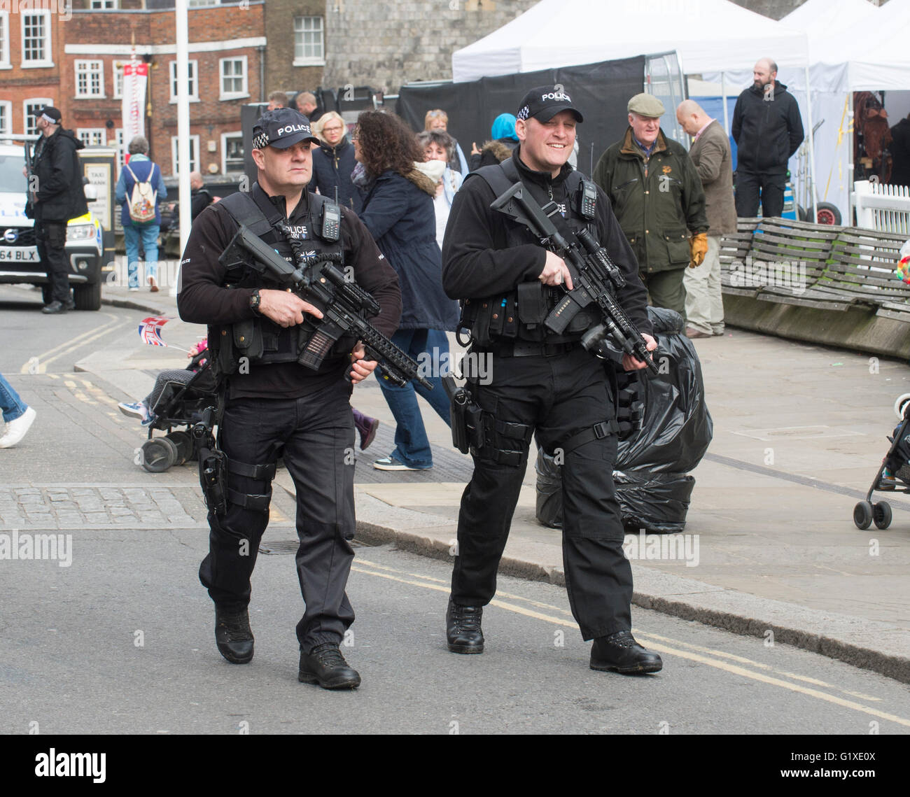 Armed British police officers secure the streets of Windsor for the ...
