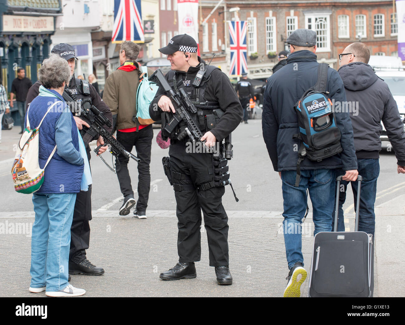 Armed British police officers secure the streets of Windsor for the ...