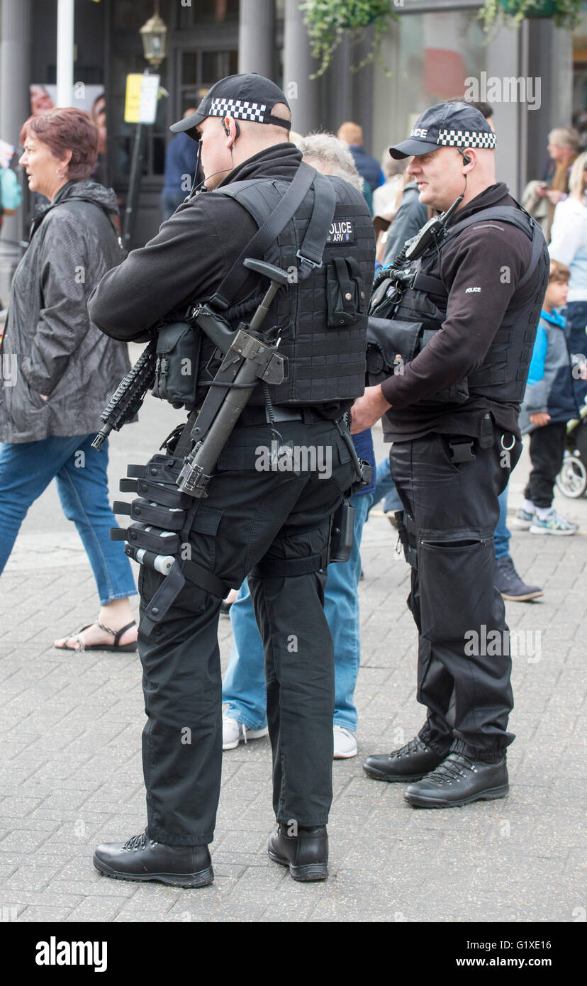 Armed British police officers secure the streets of Windsor for the ...
