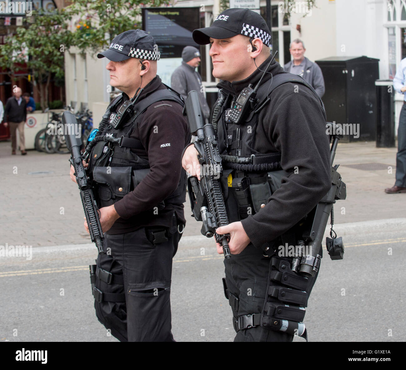 Armed British police officers secure the streets of Windsor for the ...
