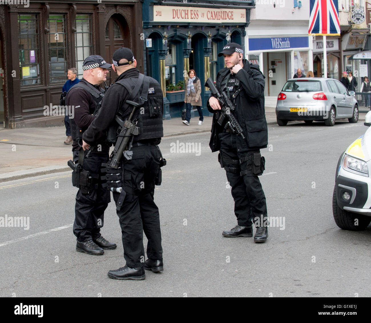 Armed British police officers secure the streets of Windsor for the ...