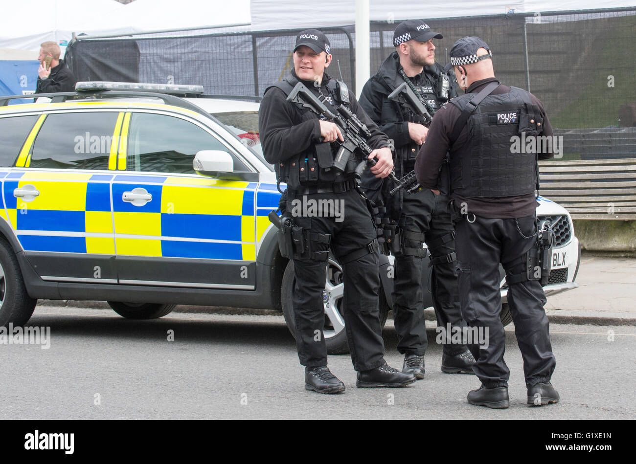 Armed British police officers secure the streets of Windsor for the ...