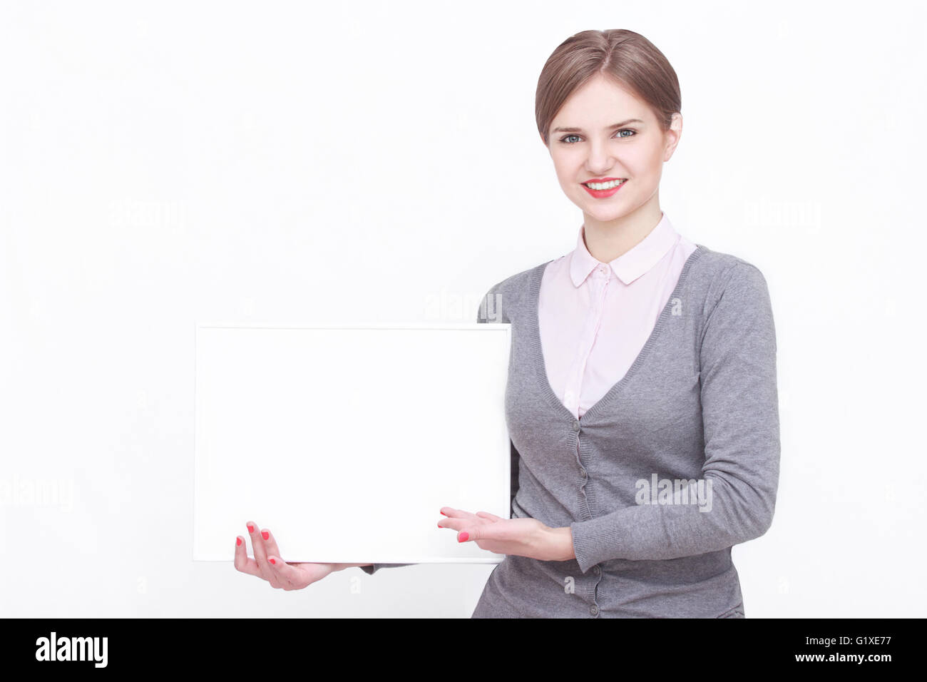 happy woman holding white blank paper Stock Photo - Alamy