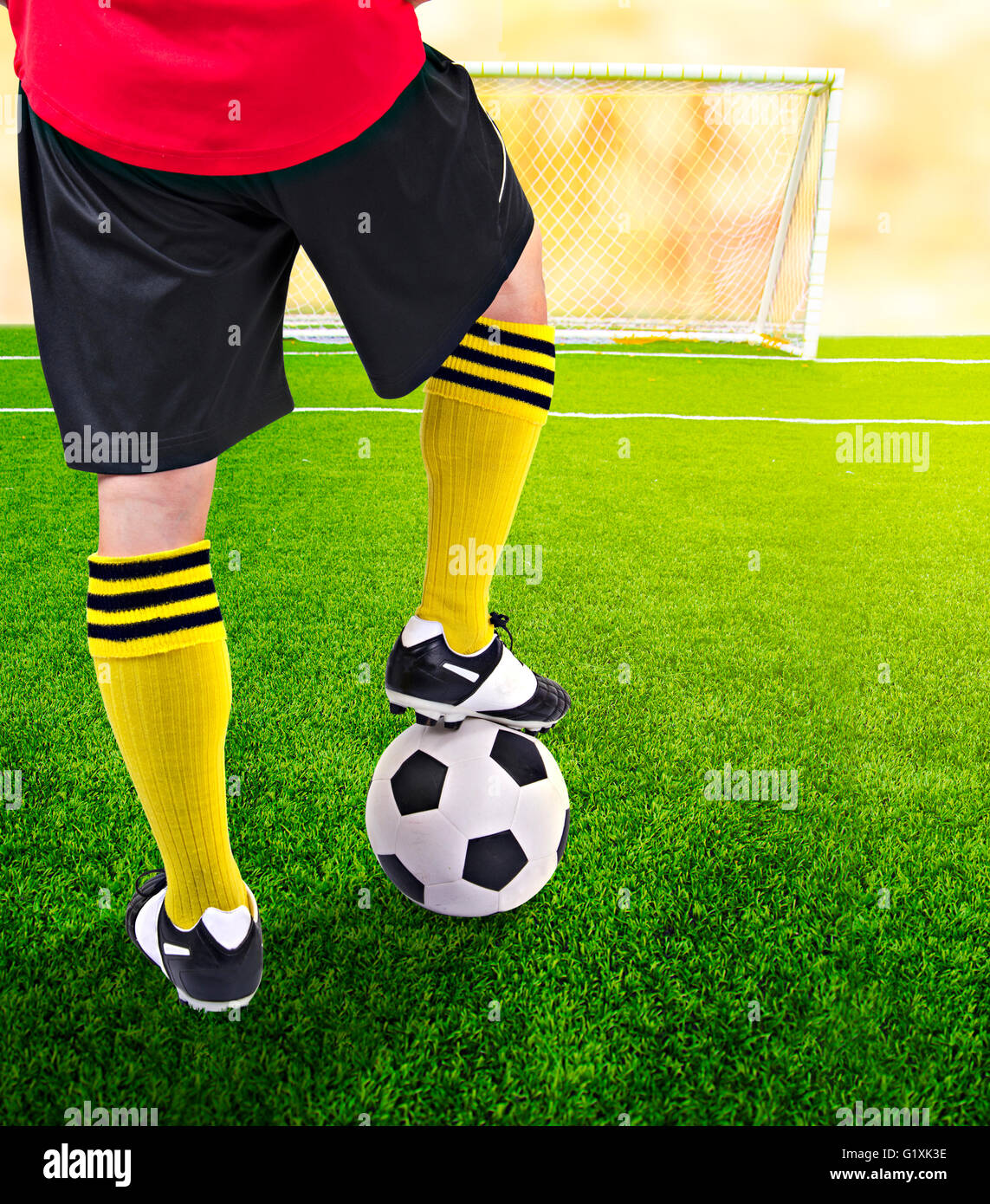 A soccer ball in front of goal Stock Photo - Alamy