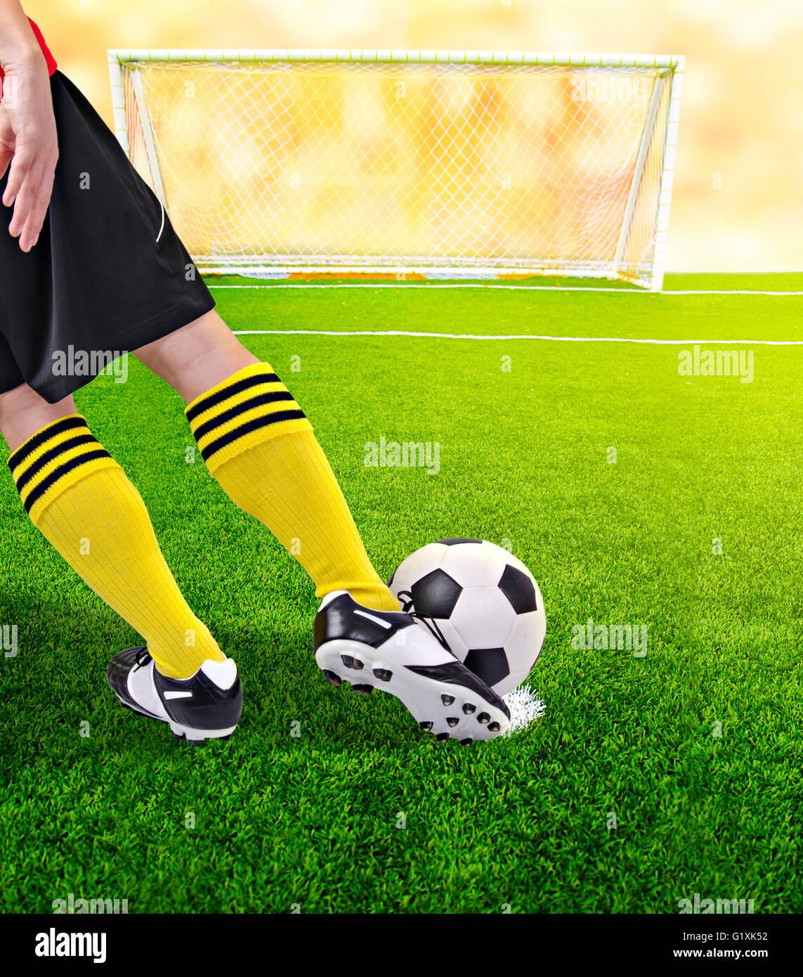 A soccer ball in front of goal Stock Photo - Alamy