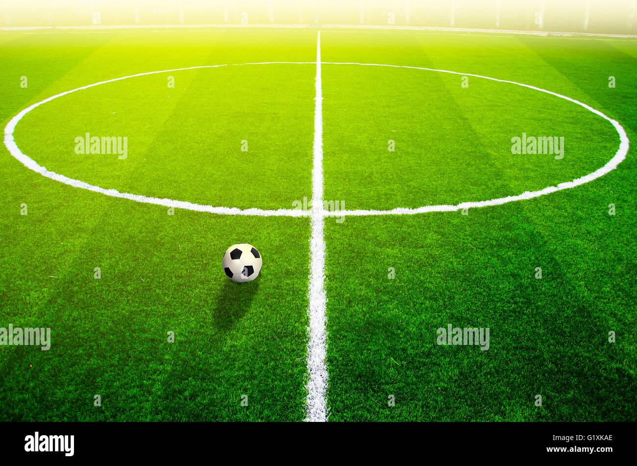 Soccer ball on the field Stock Photo - Alamy
