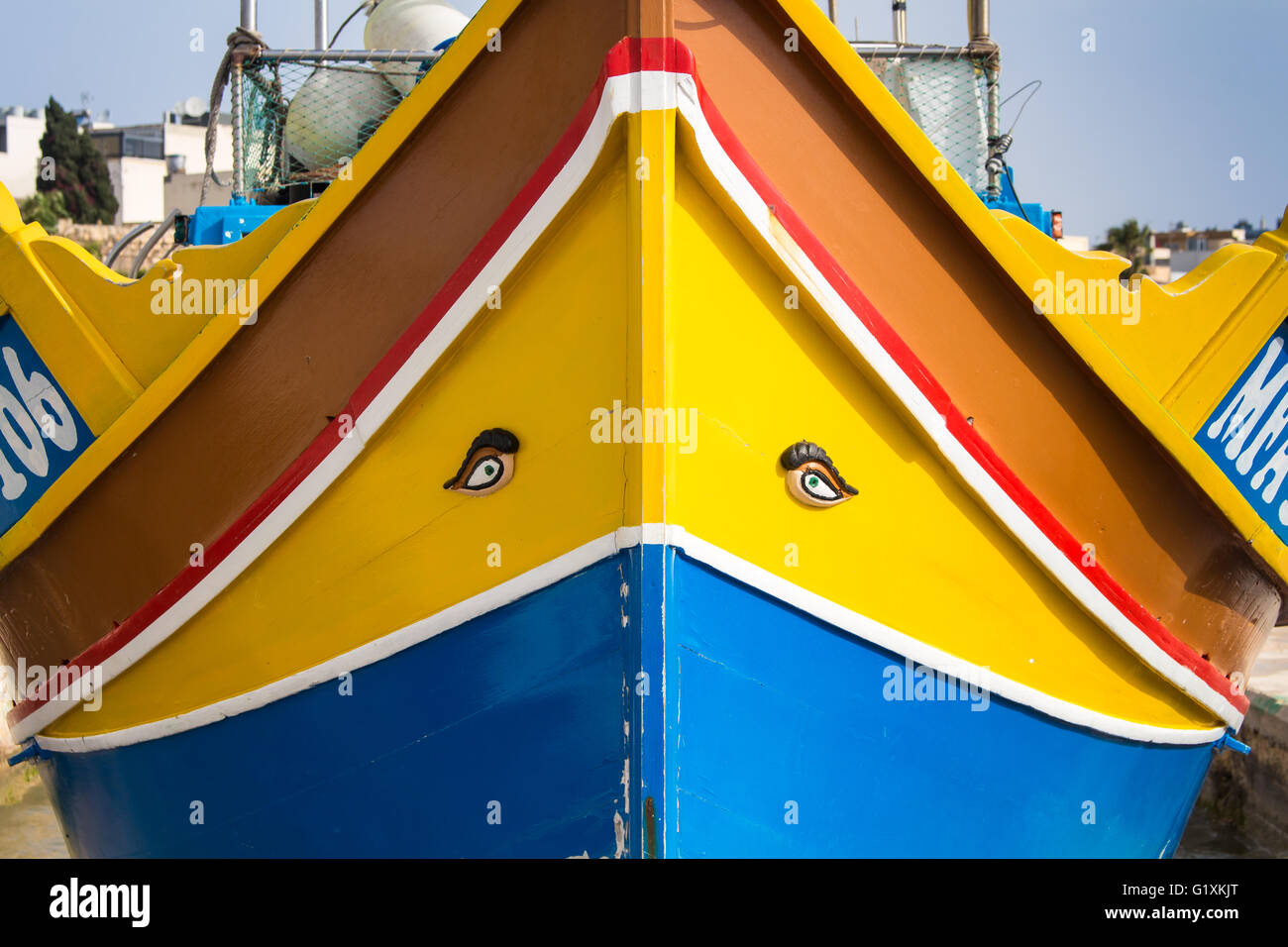 Traditional colorful fishing boat. Painted eyes for a good luck ...