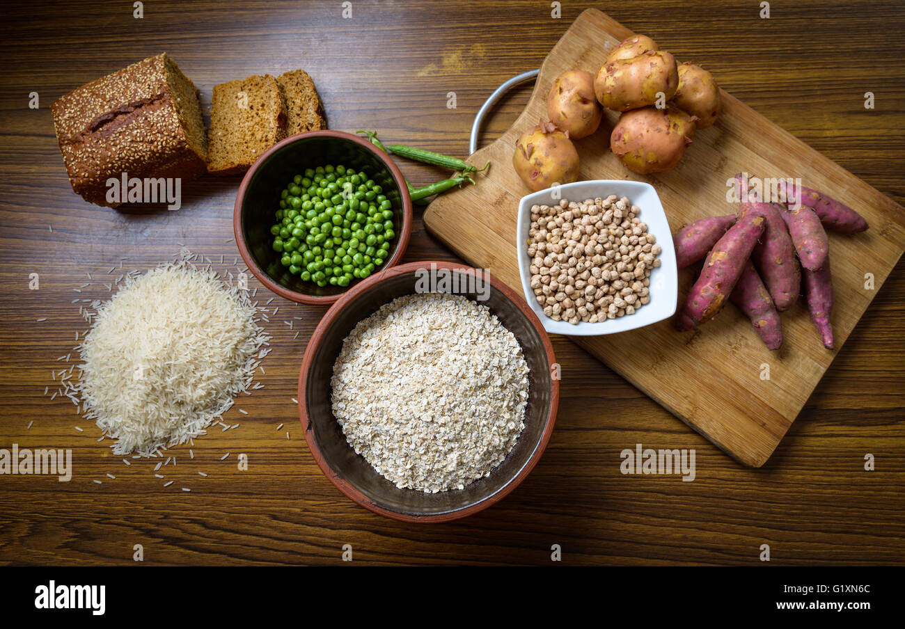 Food ingredient on wooden kitchen table Stock Photo - Alamy