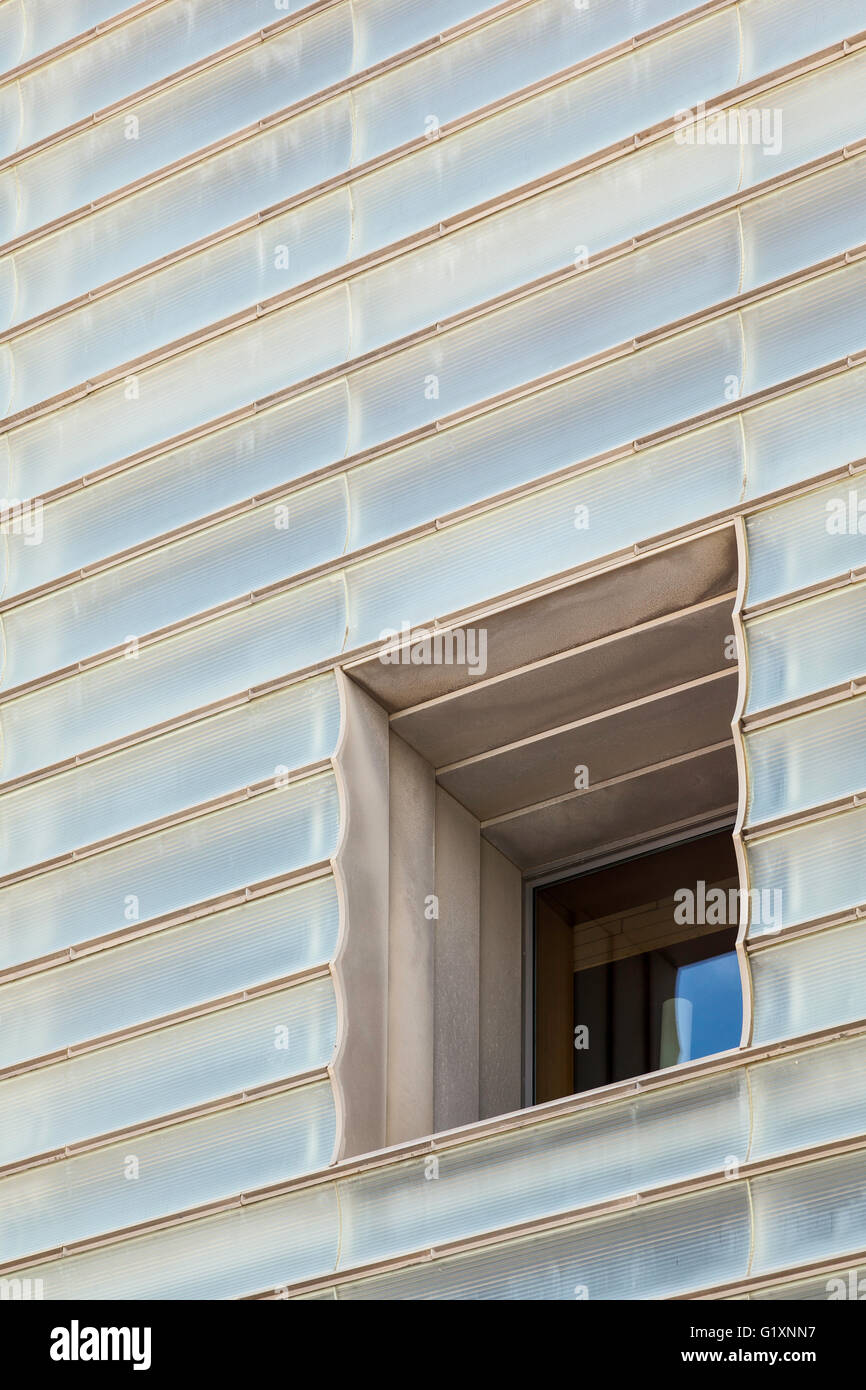 The semi-transparent ribbed facade with three one window of the Palacio ...