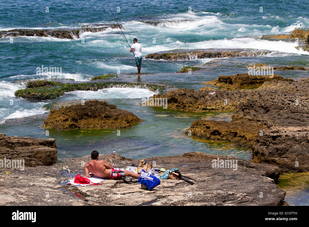 Beirut Lebanon, 20th May 2016. A sunbather enjoys the sun on the ...