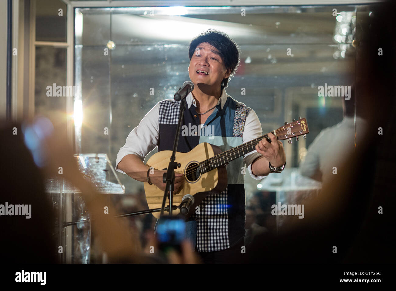 New York, USA. 20th May, 2016. Singer Emil Wakin Chau sings during a ...
