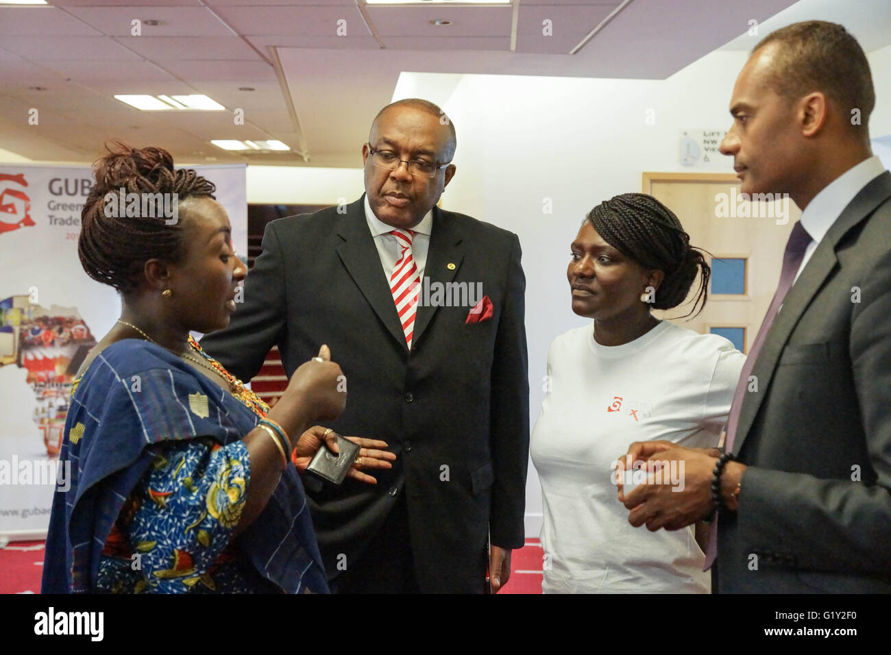 London, England. 20 May 2016. (L to R) Unknown dignitary, H.E. Victor ...