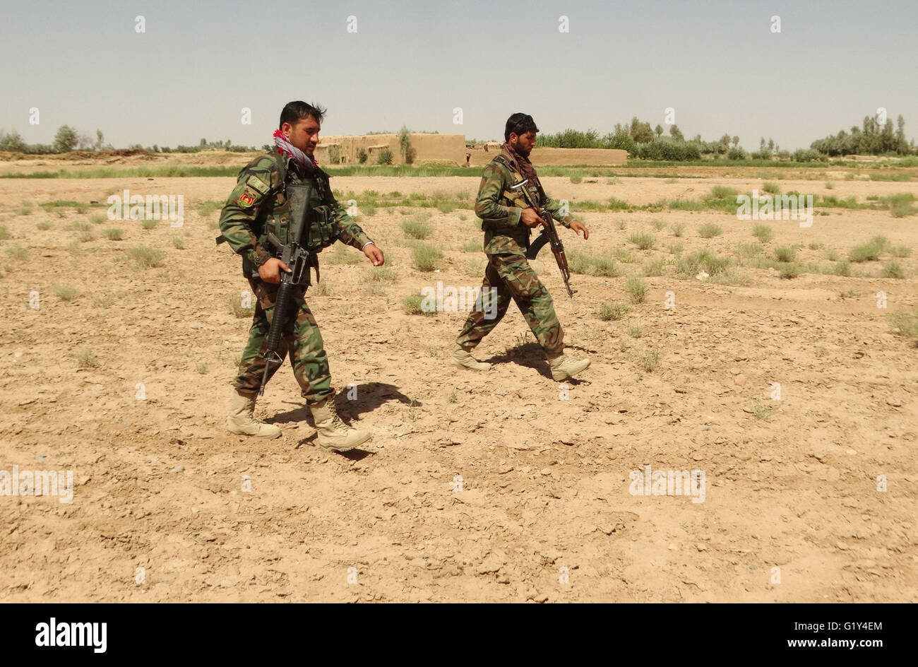 Lashkar Gah, Afghanistan. 20th May, 2016. Afghan army soldiers walk ...