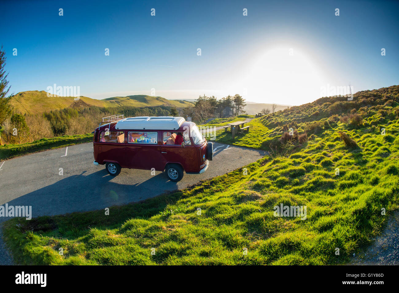 A classic red 1972 Volkswagen VW T2 (type 2) camper van, parked up in ...
