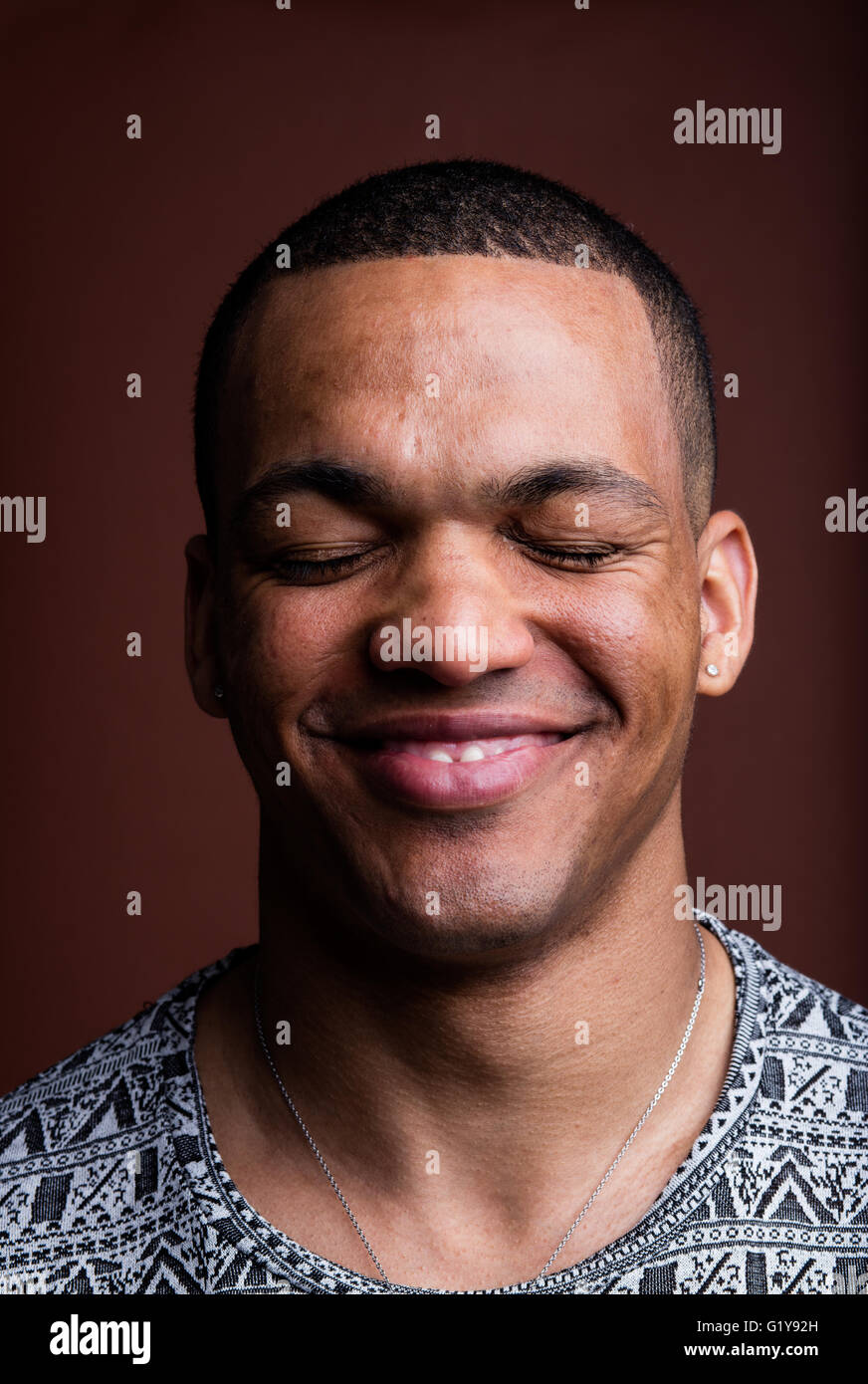 closed eyes portrait of an afroamerican man smiling Stock Photo - Alamy
