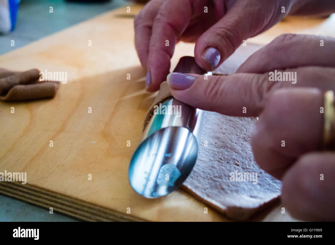 Female hands rolling chocolate hi-res stock photography and images - Alamy