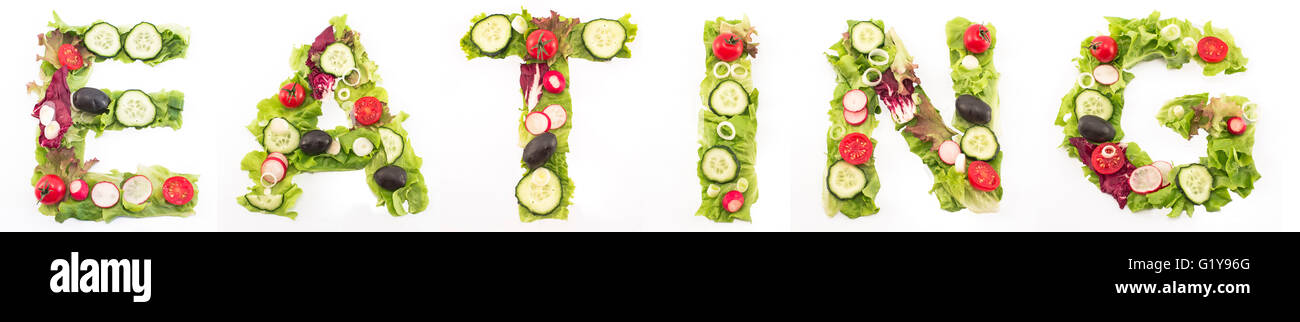 Word eating made of salad Stock Photo - Alamy
