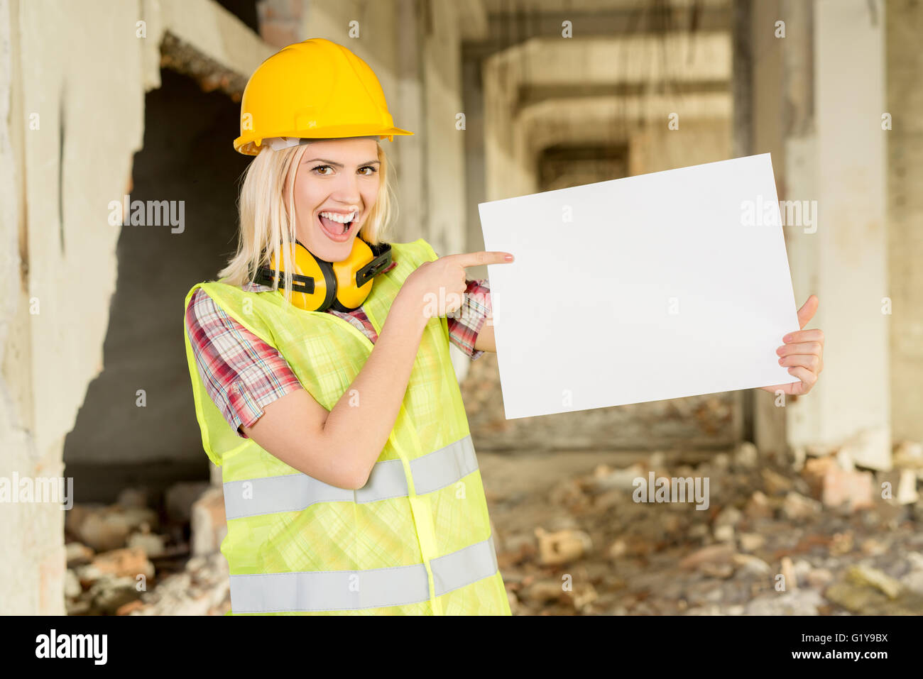 Happy female builder showing hi-res stock photography and images - Alamy