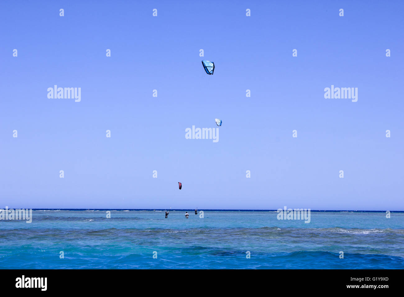 Parasail on blue sky Stock Photo - Alamy