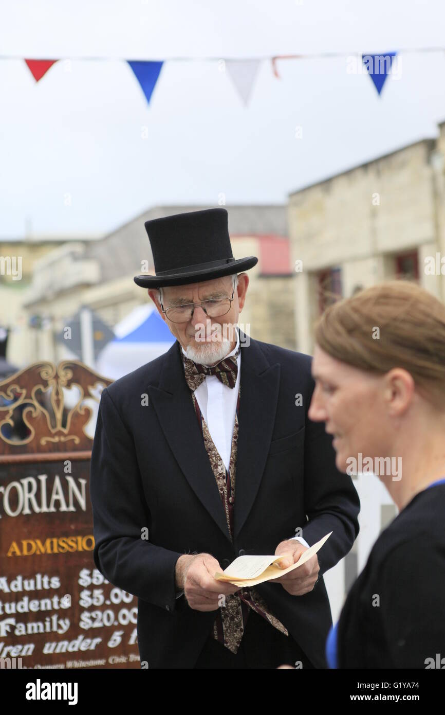 old man sending leaflet at the entrance of Oamaru's Network Waitaki ...