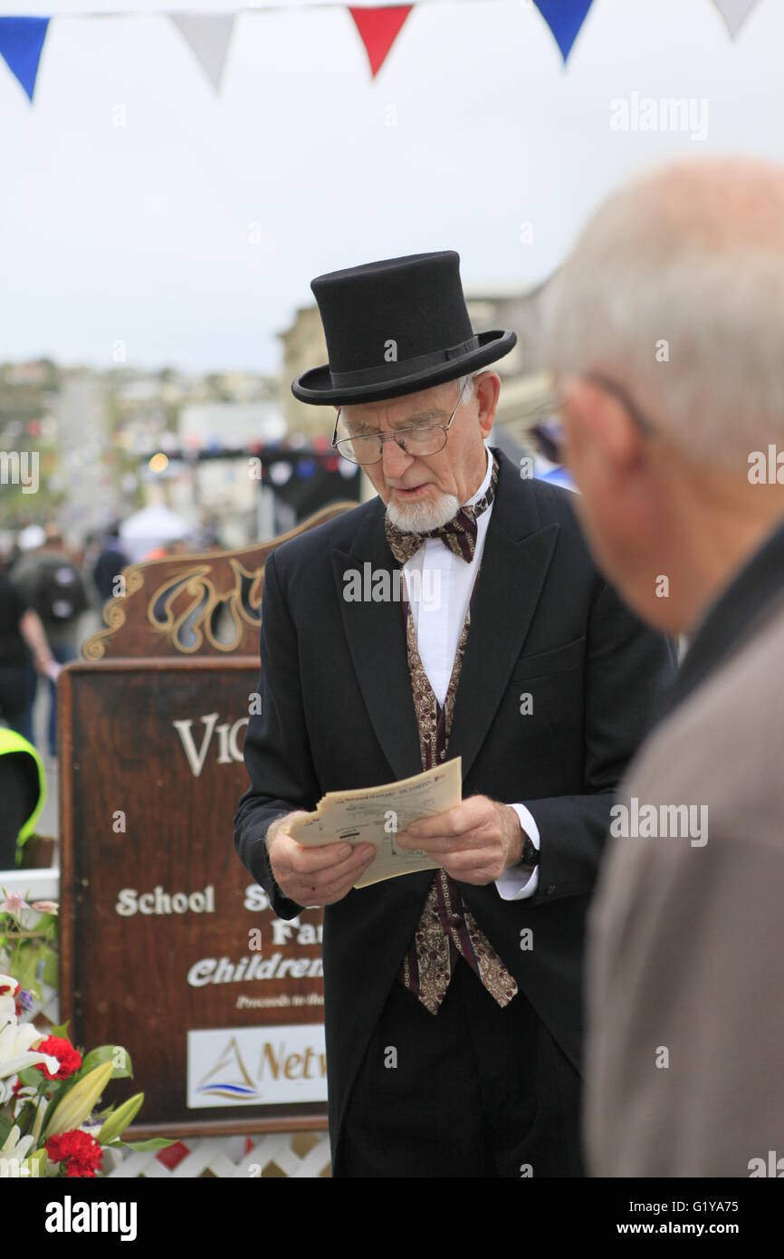 old man sending leaflet at the entrance of Oamaru's Network Waitaki ...