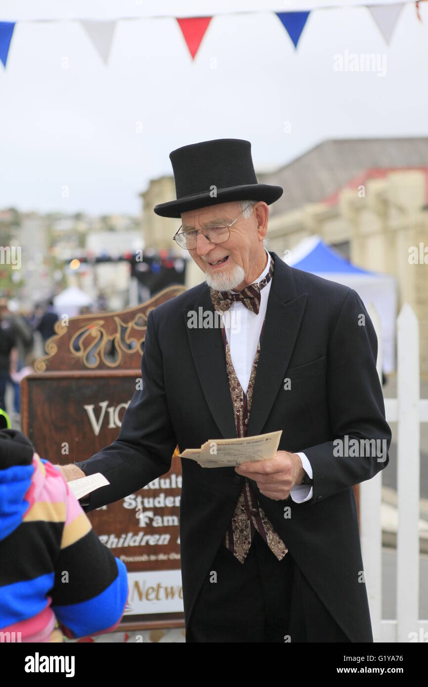 old man sending leaflet at the entrance of Oamaru's Network Waitaki ...