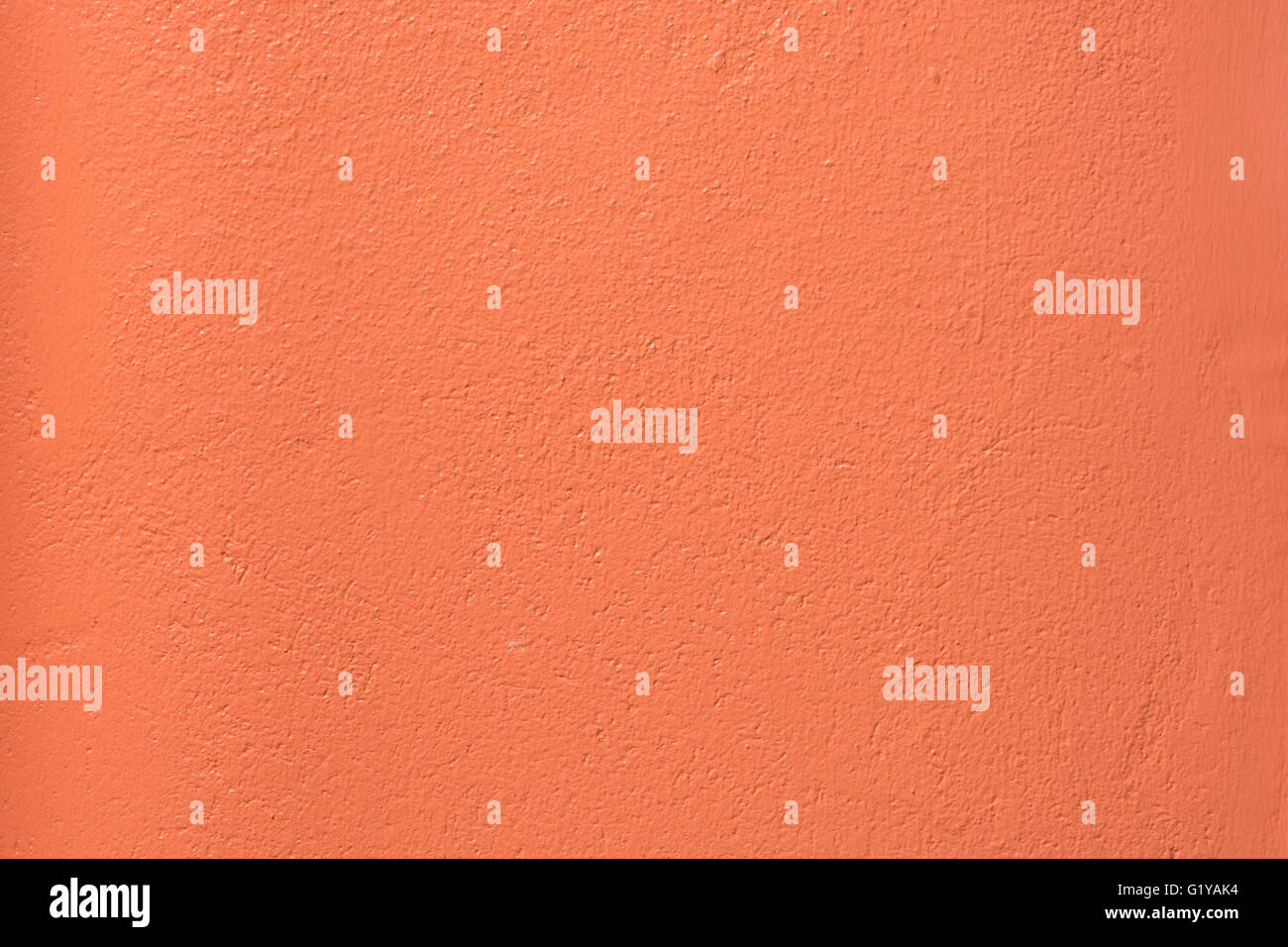 Colorful concrete wall Fiesta orange color Stock Photo - Alamy