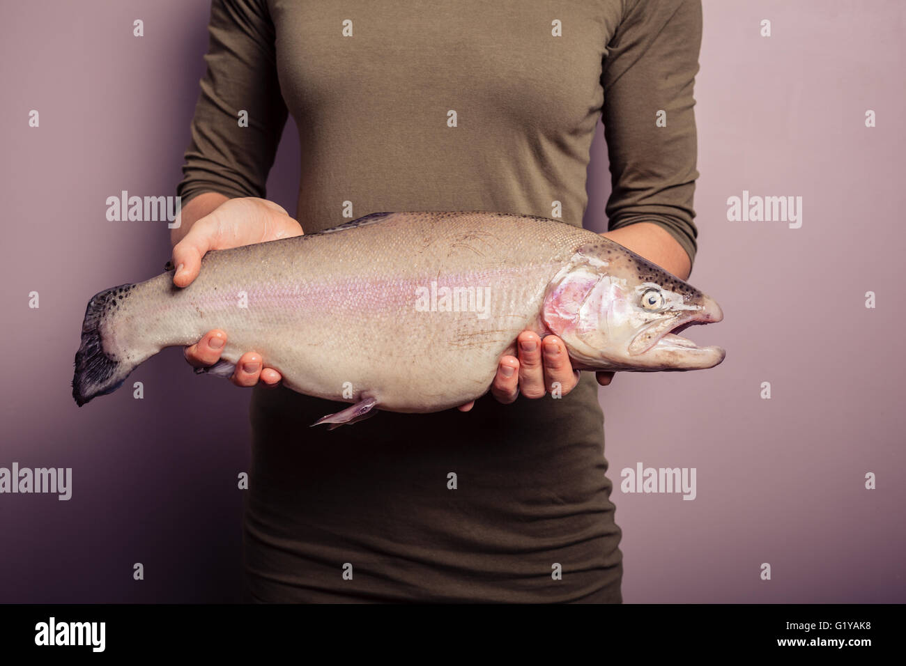 Angler holding large fish woman hi-res stock photography and images - Alamy
