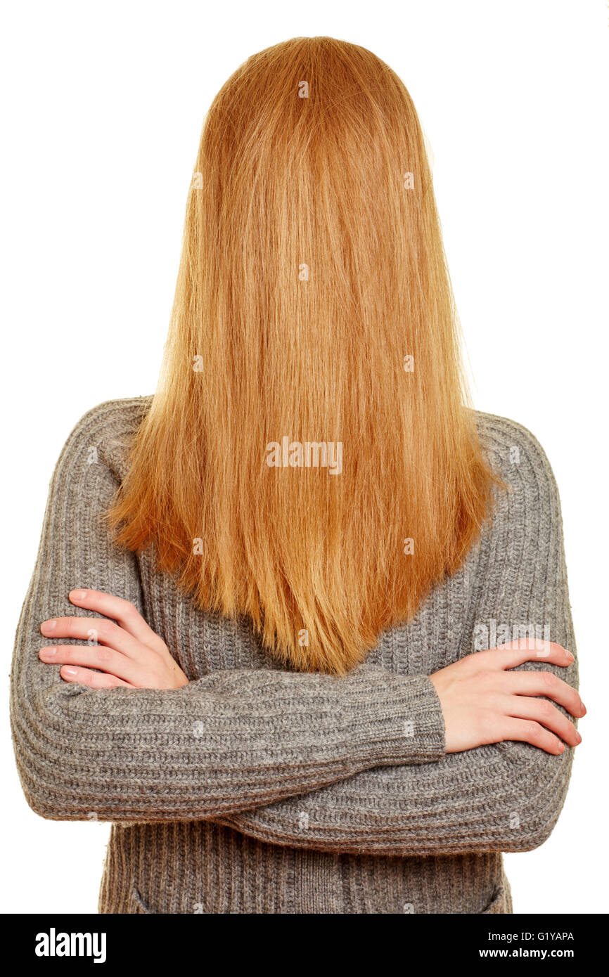 Blond young woman with her long hair over her face Stock Photo - Alamy