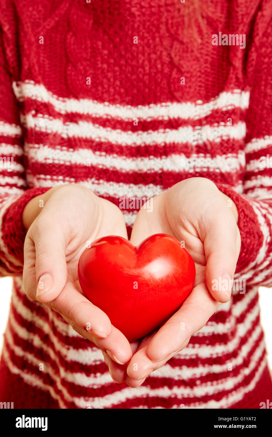Woman holding heart both hands palm hi-res stock photography and images ...