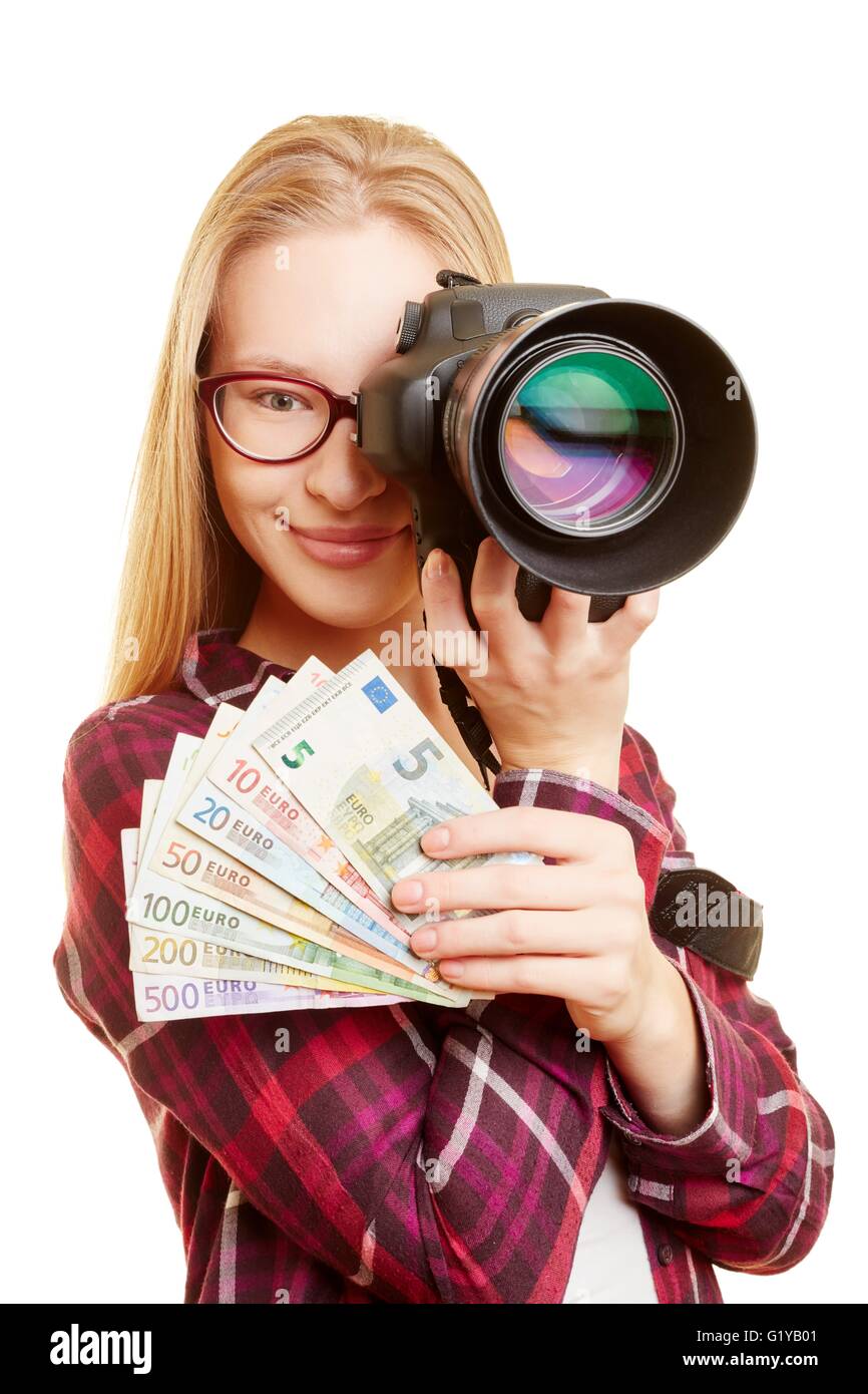 Successful woman as photographer with money and camera Stock Photo - Alamy