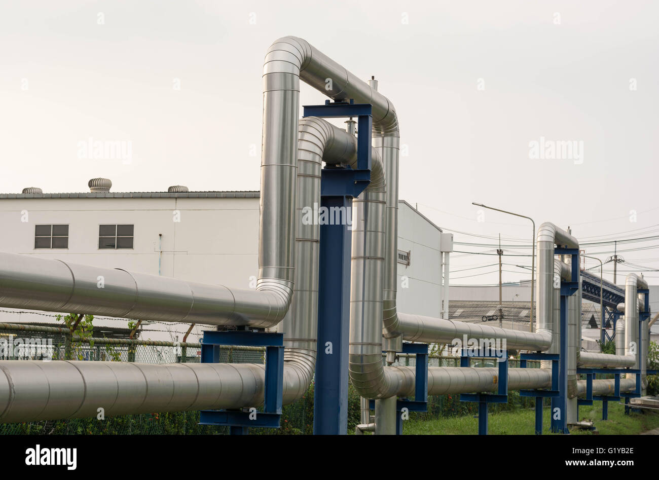 industrial pipelines on pipe-bridge Stock Photo - Alamy