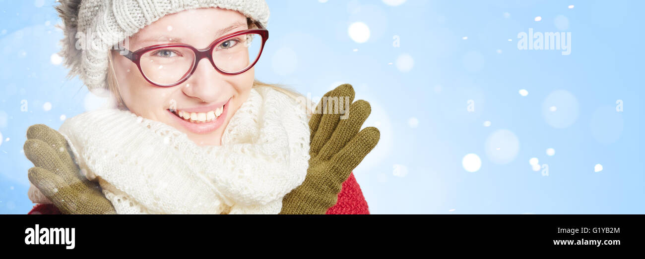 Face of a smiling woman in the snow in winter in panorama format Stock ...