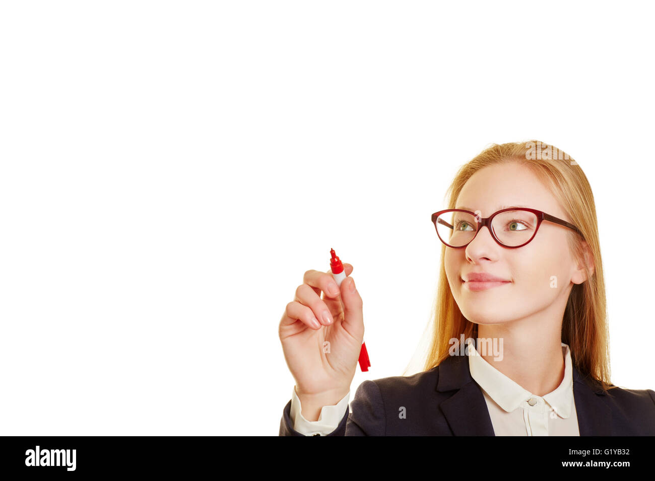 Woman wearing glasses in a suit writing with a red pen Stock Photo - Alamy